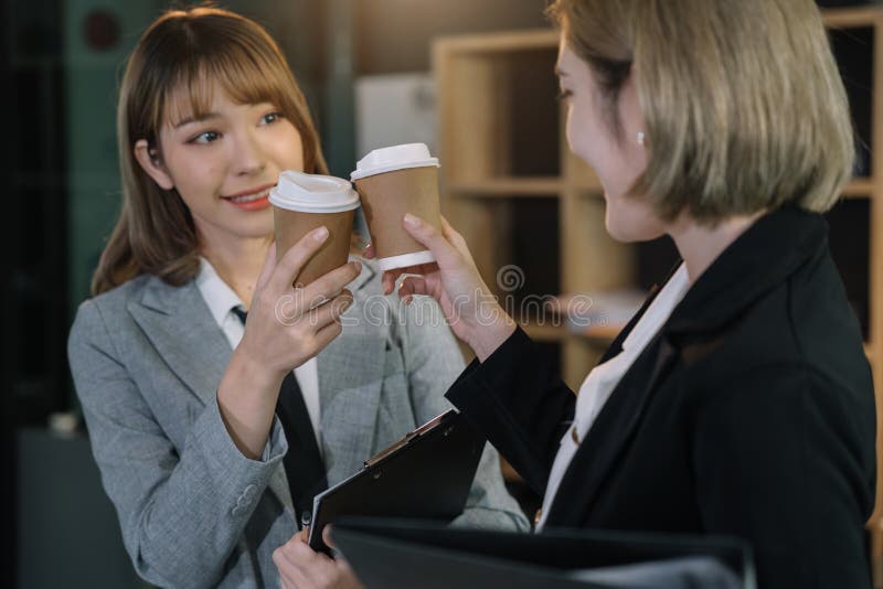 Colleagues Clinking Cups of Coffee in Office Stock Image - Image of analyzing, businesswomen ...