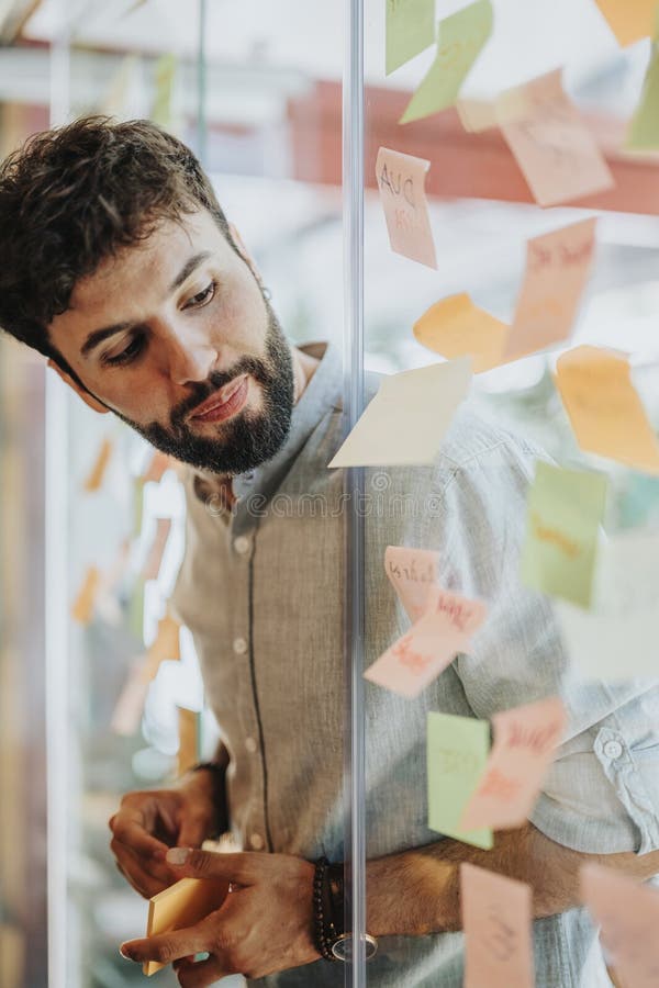 Colleagues Collaborate, Brainstorm Ideas, and Plan Projects in a ...