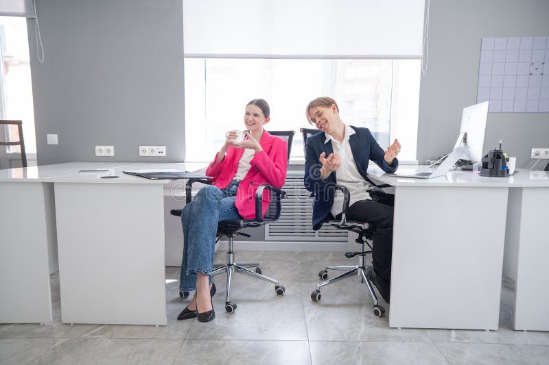 Colleagues Communicate while at Work in the Office. Stock Photo - Image ...