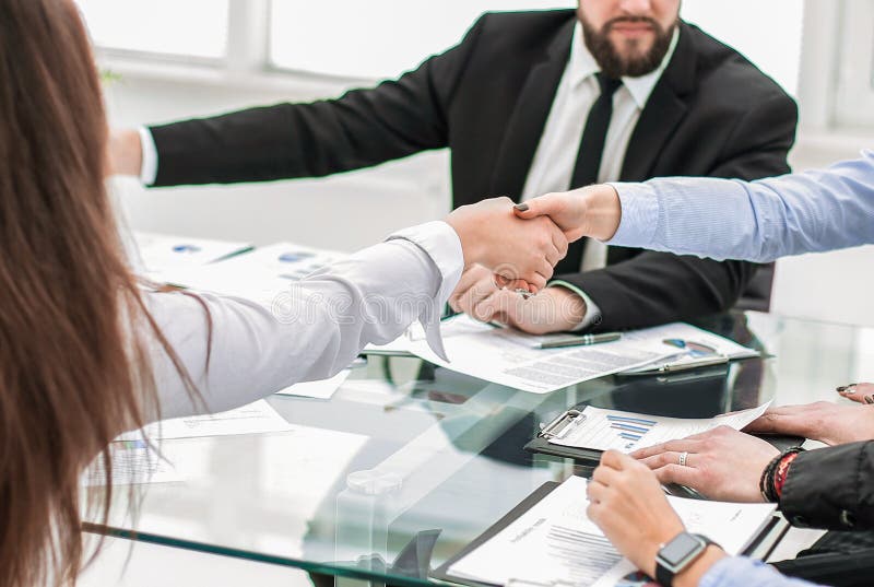 Colleagues Confirming the Job with a Handshake Stock Image - Image of ...