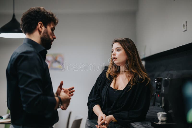 Colleagues in Conversation during a Coffee Break in Office Kitchen ...