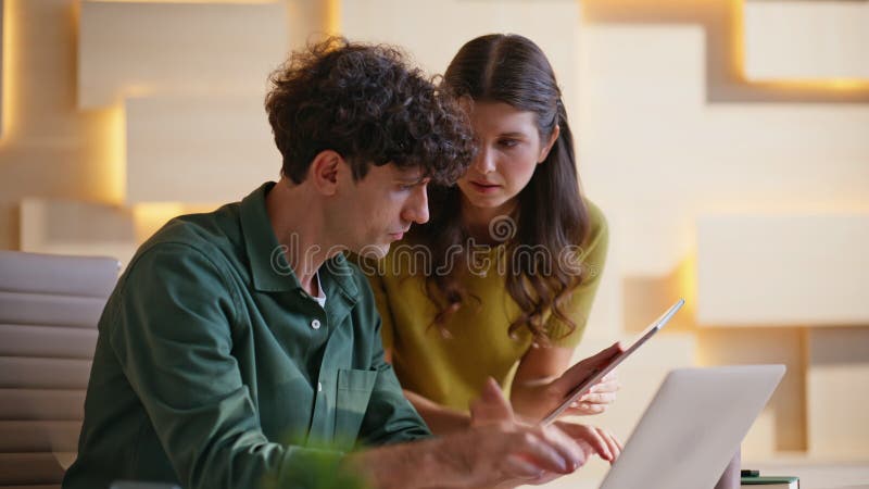 Colleagues Cooperating Digital Tasks at Modern Office Closeup. Two Coworkers Stock Image - Image ...