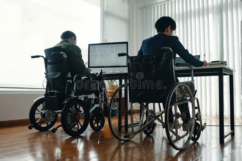 Colleagues with Disability Working on Computers Stock Image - Image of ...