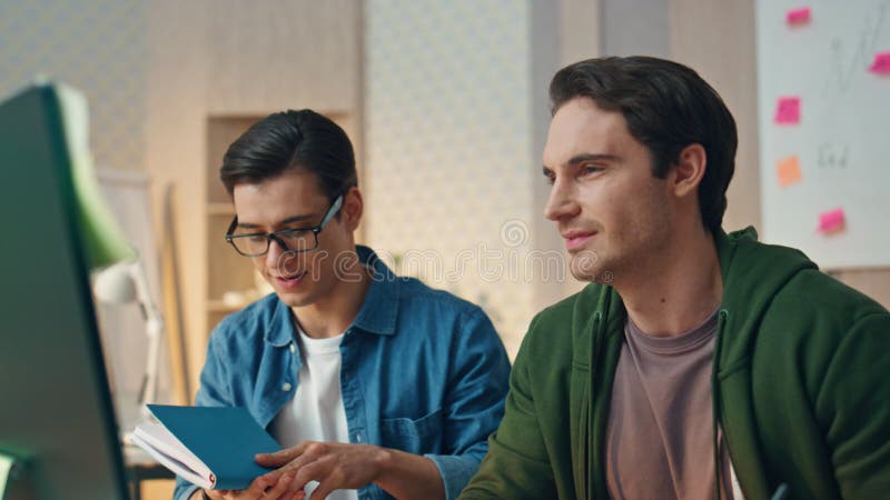 Colleagues Discussing Computer Project Together Closeup. Office Guys ...