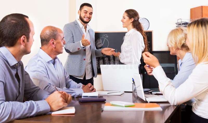 Colleagues Discussing Price Development Stock Image - Image of office ...