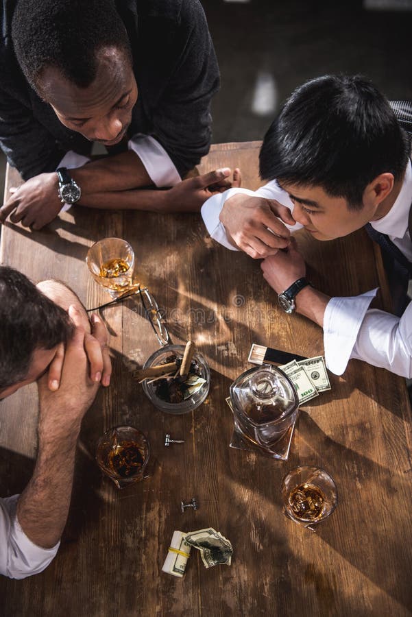 Colleagues Drinking Alcohol while Spending Time Together Stock Photo ...