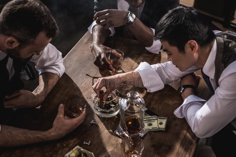 Colleagues Drinking Alcohol while Spending Time Together Stock Image ...