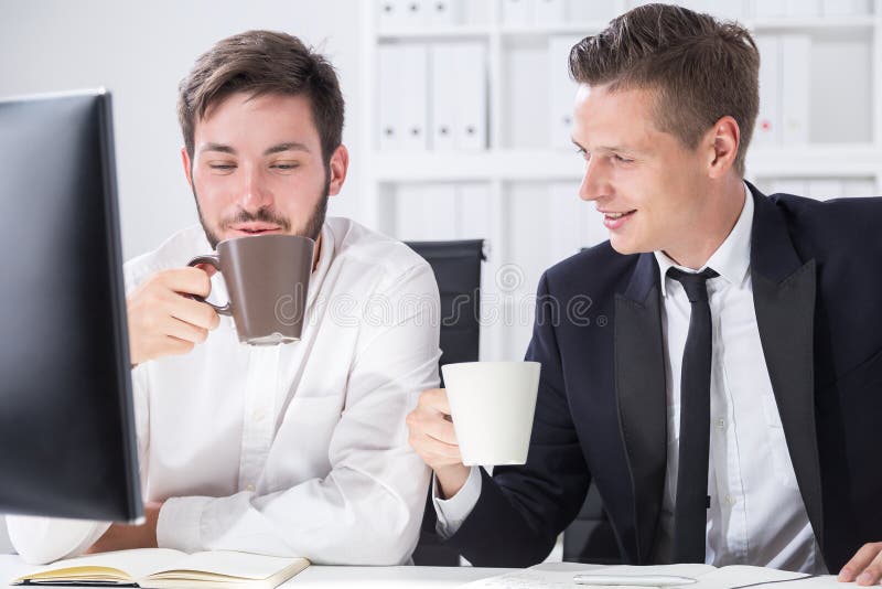 Colleagues drinking coffee stock image. Image of coffee - 75701519