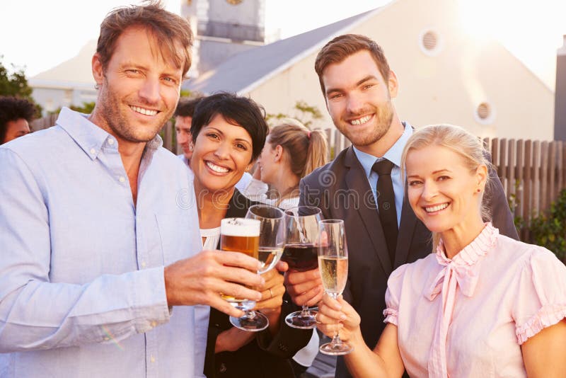 Colleagues Drinking after Work at a Rooftop Bar Stock Image - Image of ...