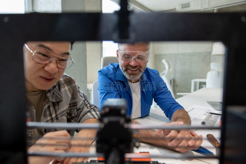 Engineers Working with 3D Printer Process of Printing. Stock Image ...