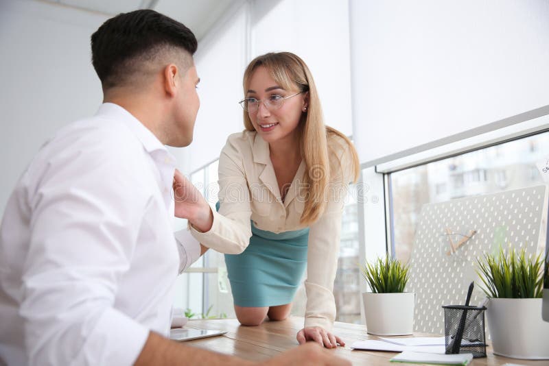 Colleagues Flirting with Each Other during Work in Office Stock Photo ...