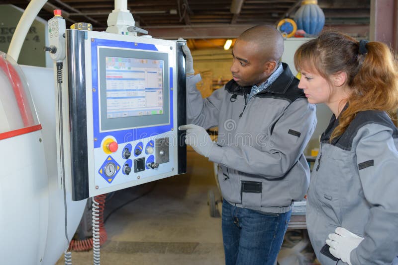 Colleagues in Front Machine Stock Photo - Image of speed, show: 83783568