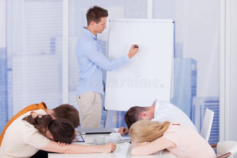 Colleagues Getting Bored during Business Presentation Stock Photo ...