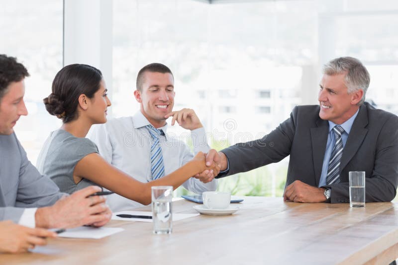 Colleagues Greeting Each Other Stock Photo - Image of mature, handsome ...