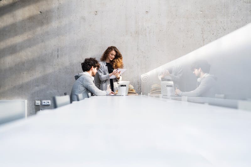 Colleagues Helping Each Other, Working on Project Together ...