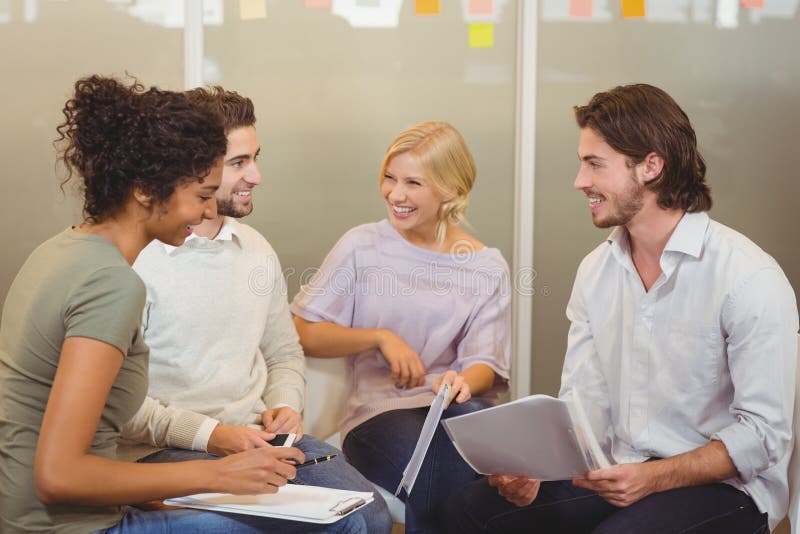 Colleagues Interacting with Each Other Stock Photo - Image of design ...