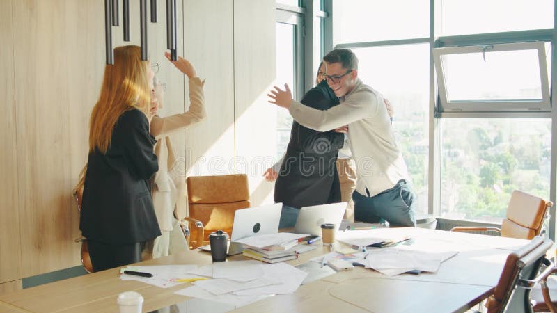Team Celebrates Success with a Joyful Gathering at the Office, Marking ...