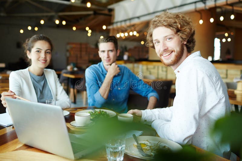 Colleagues at lunch break stock photo. Image of associates - 99262840