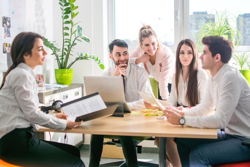 Colleagues at an Office Meeting. Stock Image - Image of working, table ...