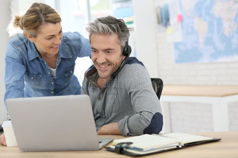 Colleagues at Office Working on Laptop Stock Image - Image of grey ...
