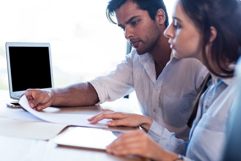 Colleagues Reading Documents Stock Image - Image of people, occupation ...