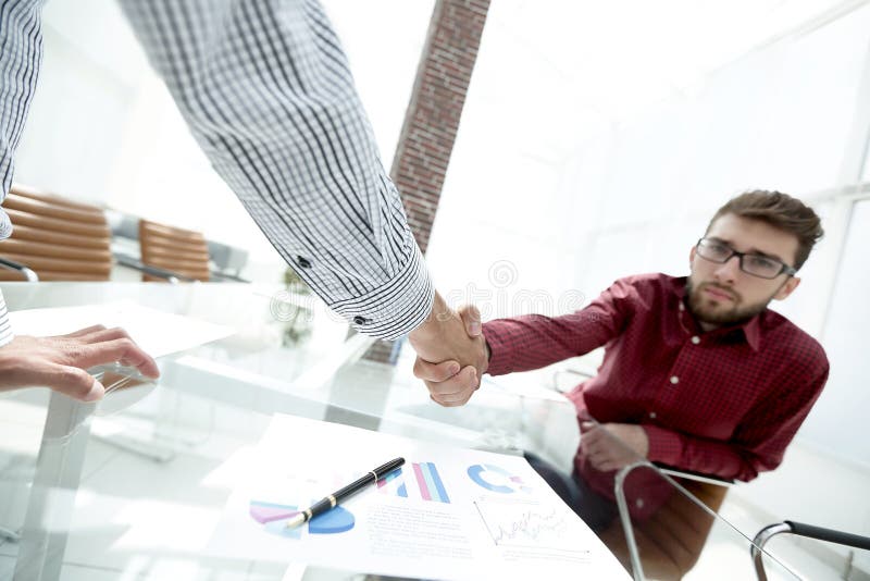 Colleagues Shaking Hands Over Desk Stock Photo - Image of office ...