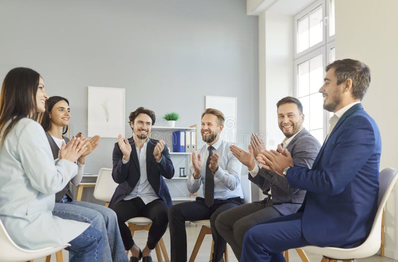 Team Members Celebrating Success in a Modern Office Environment during ...