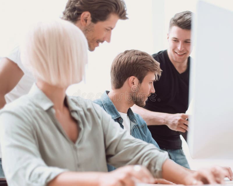 Colleagues Use a Computer for Office Work. Stock Image - Image of ...