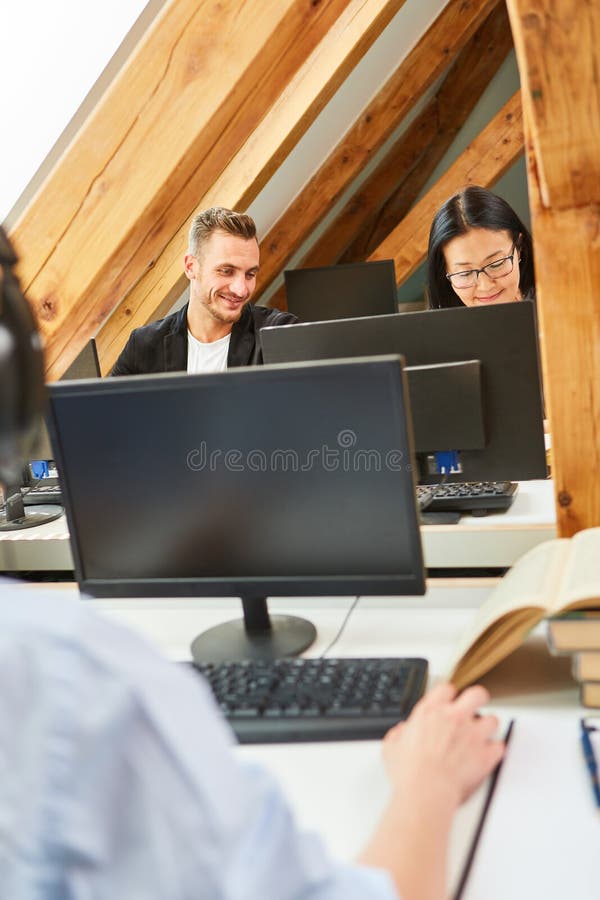 Colleagues Work at the Coworking Office at the Computer Stock Photo ...