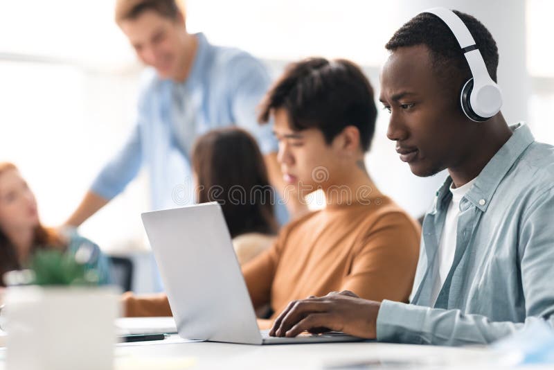Colleagues Working on a Project Using Technology Stock Photo - Image of ...