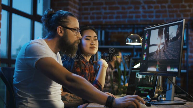 Colleagues Working on Video Edit Stock Video - Video of display, cutter ...