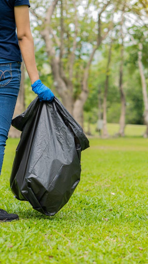 Collect Garbage in the Ecological Group Park. Concept of Environmental ...