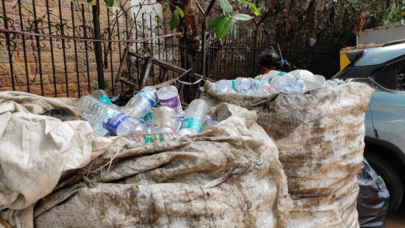Collected Plastic Waste in Sacks Stock Photo - Image of clothing, rock ...