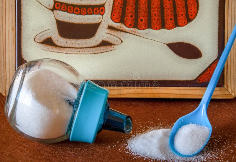 Bottle of sugar overturned stock photo. Image of weight - 144042742