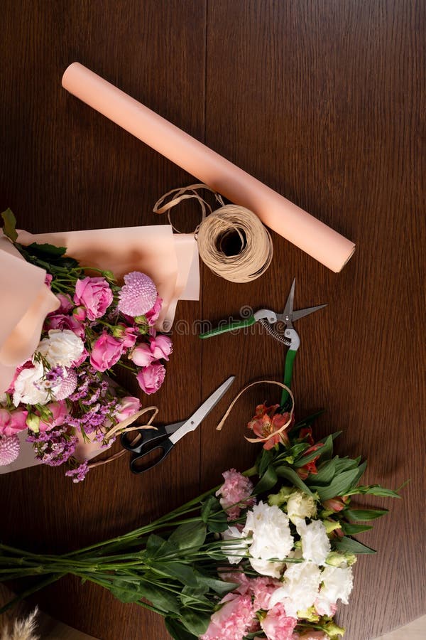 Collecting Compositions of Bloom Mixed Flowers in the Floral Studio. Process of Assembling a ...