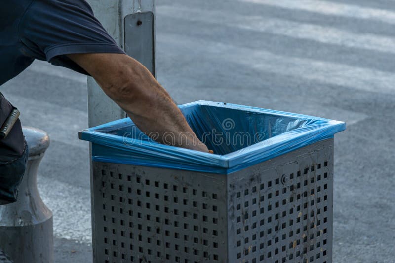 Collecting from the Garbage Bin Stock Photo - Image of environmental ...