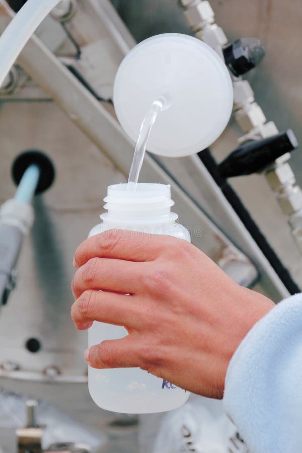 Collecting water sample stock photo. Image of laboratory - 119639808