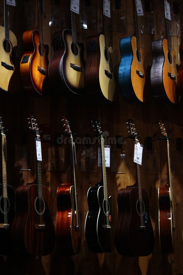 Collection of Acoustic Guitars Displayed in the Store. Stock Photo ...