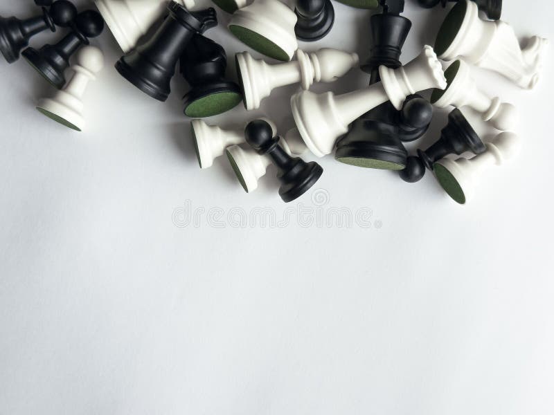Collection of Black and White Chess Pieces on a Minimalist White ...