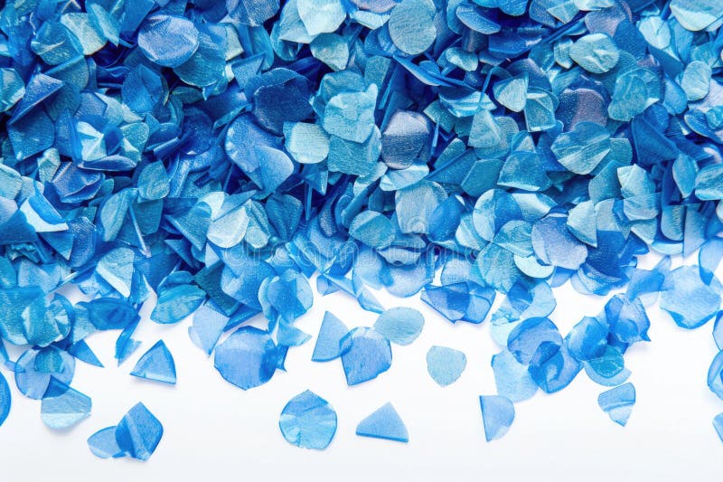 A Collection of Blue Glass Shards Scattered on a White Surface Stock ...