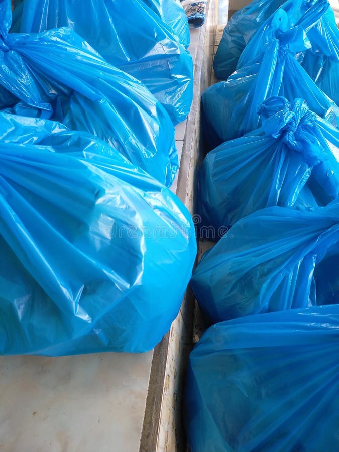 A Collection of Blue Plastic Containing Items Stock Photo - Image of ...