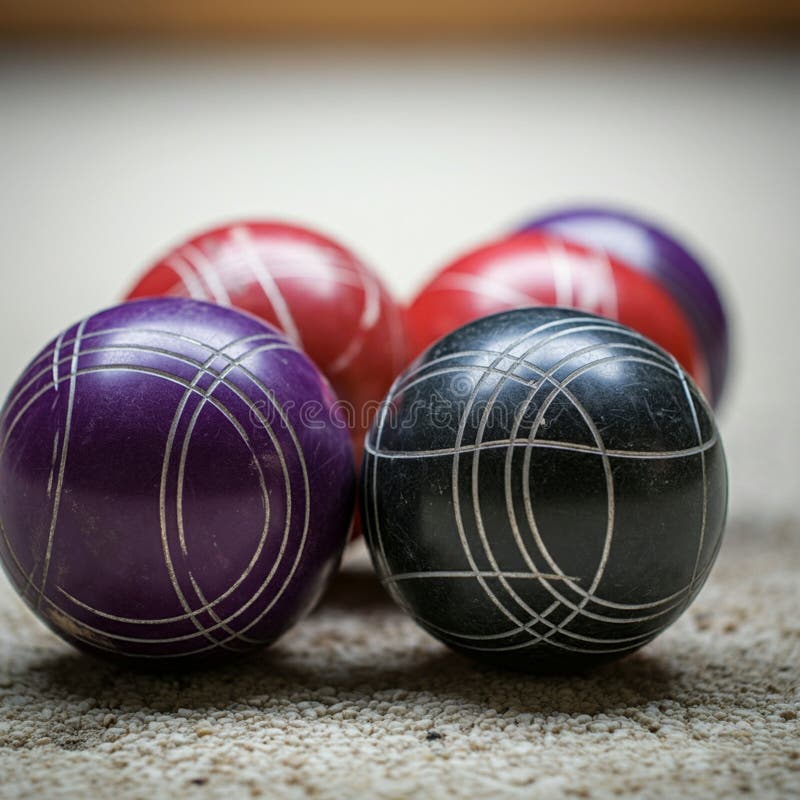 A Collection of Bocce Balls on a Textured Carpet Surface. the Balls ...