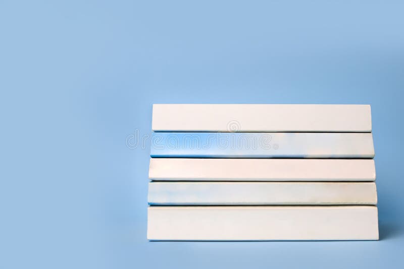 Collection of Books on Light Blue Background, Space for Text Stock ...