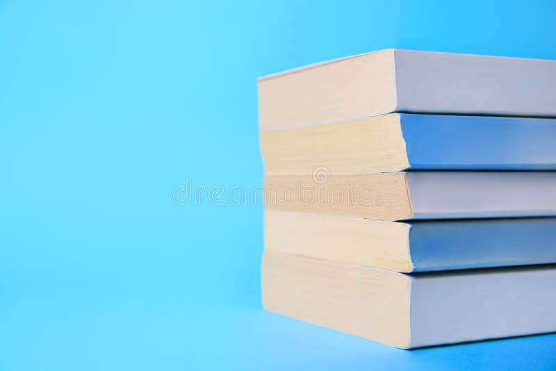 Collection of Books on Light Blue Background, Space for Text Stock ...