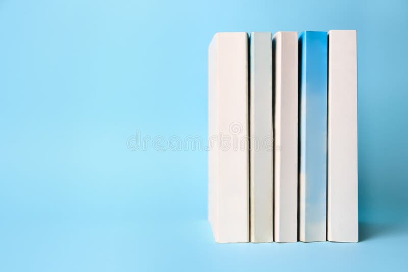 Collection of Books on Light Blue Background, Space for Text Stock ...
