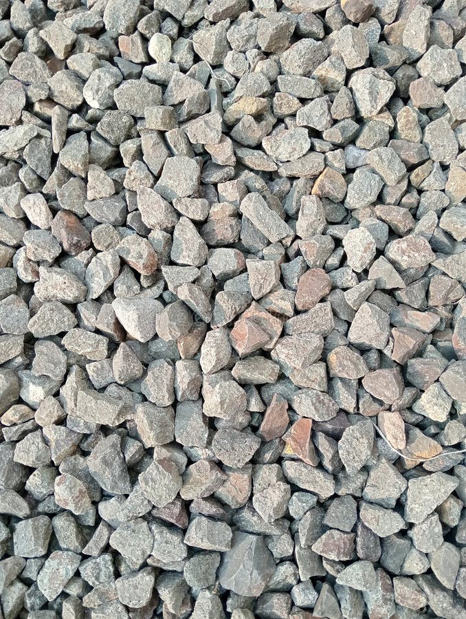 A Collection of Broken Pebbles Exposed To Morning Sunlight Stock Photo ...