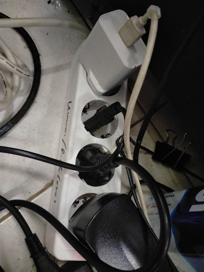 A Collection of Cables in One Socket Editorial Stock Image - Image of ...