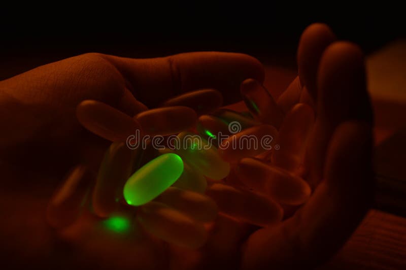 Glowing Capsule among Others in Man S Hand Stock Photo - Image of dose ...
