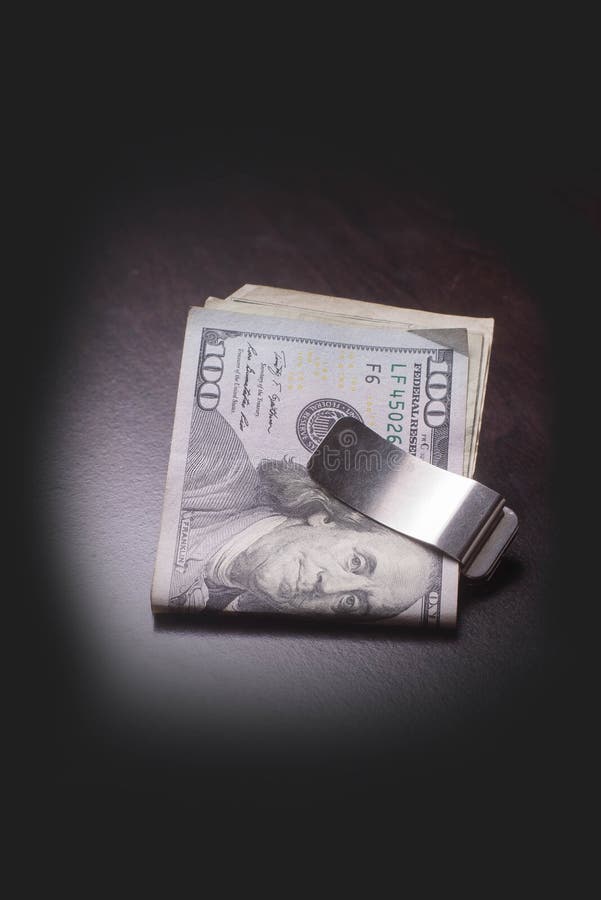 Collection of Cash Held Together in a Money Clip Stock Image - Image of ...