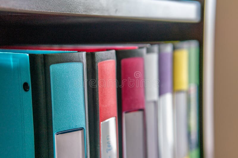 Collection of Color Coded Binders To Keep Documents Stock Photo - Image ...